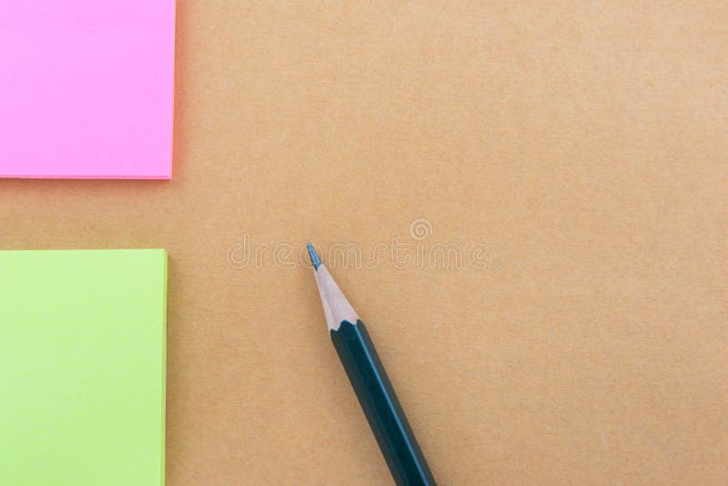 Color Paper Notes with Sticky Note on Brown Background Stock Photo ...