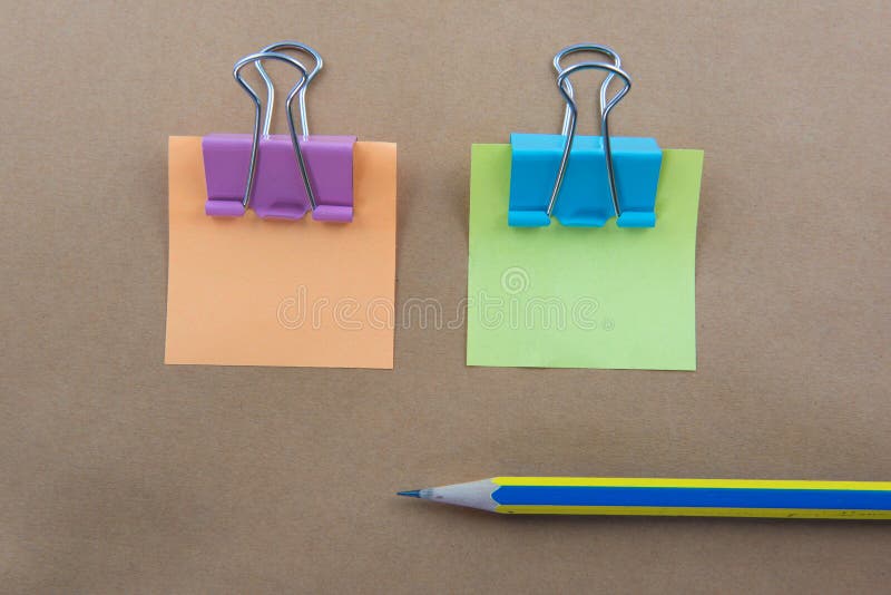 Color Paper Notes with Sticky Note on Brown Background Stock Photo ...