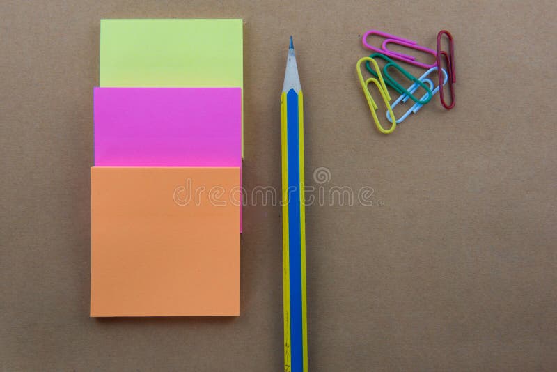 Color Paper Notes with Sticky Note on Brown Background Stock Image ...