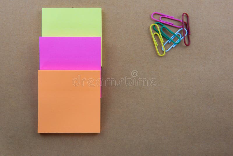 Color Paper Notes with Sticky Note on Brown Background Stock Photo ...