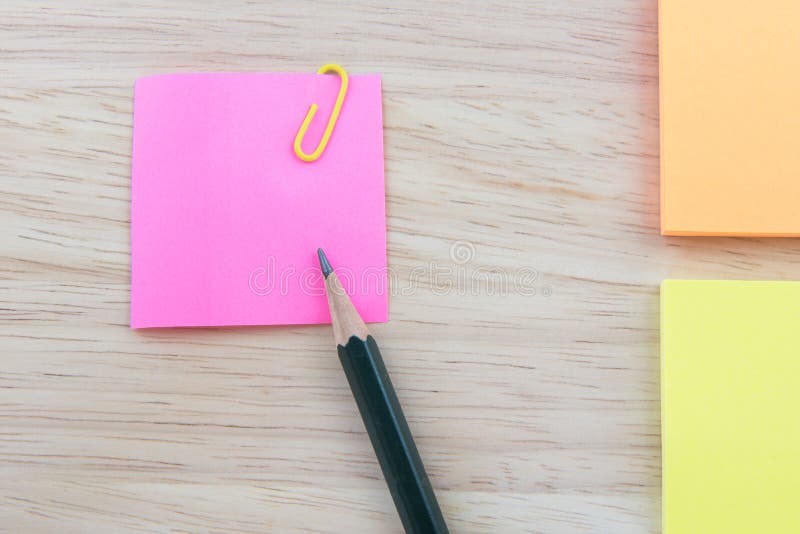 Color Paper Notes with Sticky Note on Wood Background Stock Photo ...