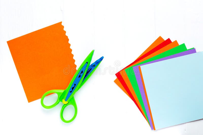 Color Paper for Origami is a Fan, Scissors with a Wavy Edge. on White ...