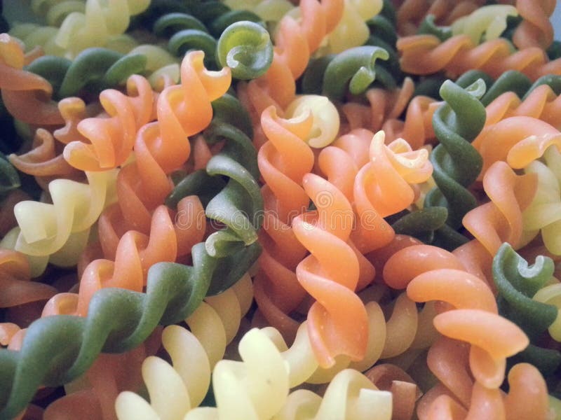 Pasta Twirls, Whole Wheat Spaghetti and Brown Rice on a Wooden Table ...