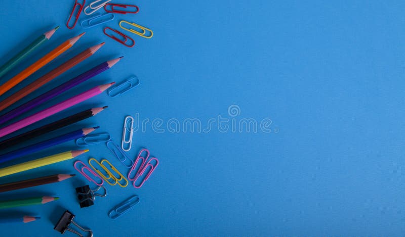 Color Pencils on Blue Background Stock Image - Image of learning ...