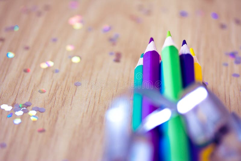 Color Pencils with Ribbon and Confetti Bokeh Stock Photo - Image of ...