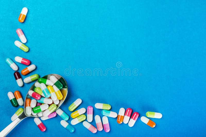Color Pills Pharmaceutical Medicine and Capsules on Spoon Stock Photo ...