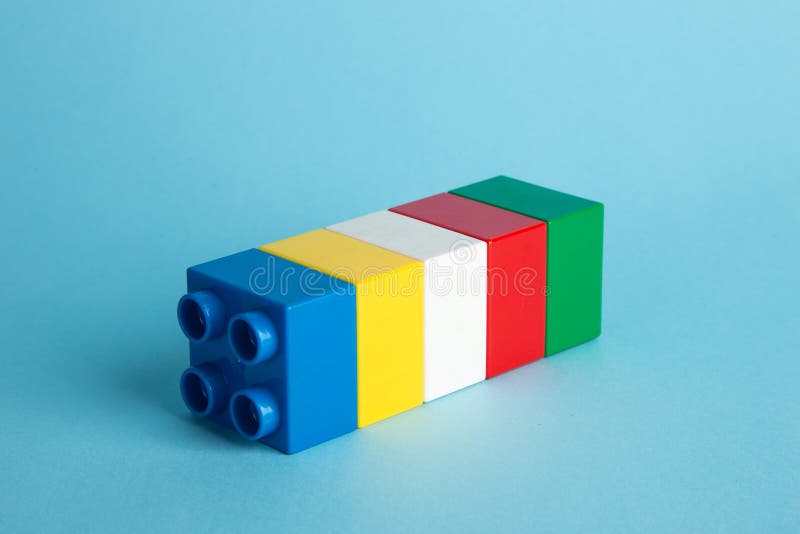 Color Plastic Building Blocks on Blue Background Editorial Stock Image ...