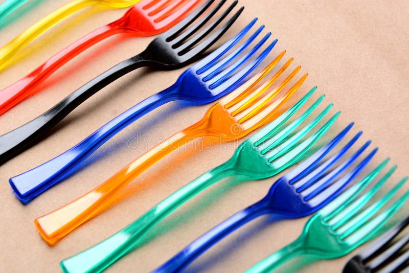 Color Plastic Forks on Paper Background Stock Image - Image of black ...