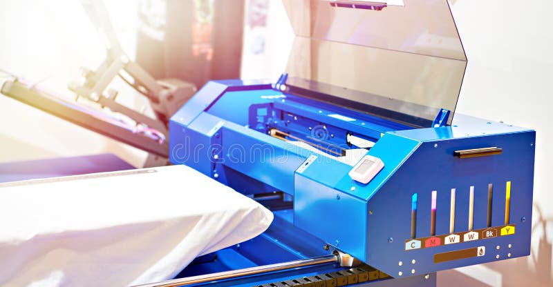 T-shirt and fabric printer stock photo. Image of device - 219024020