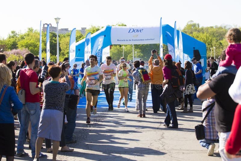 Runner Passing Under the Blue Gate Editorial Photography - Image of ...