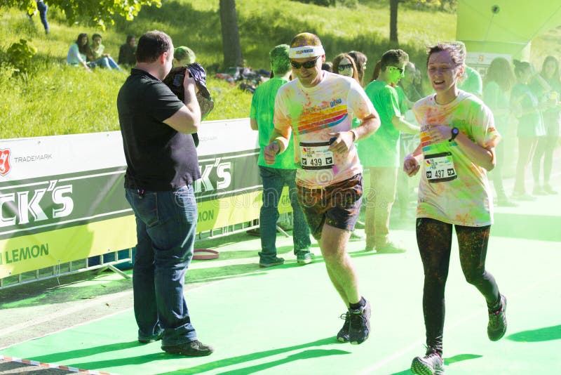 Runner Passing Under the Green Gate Editorial Photo - Image of beck ...