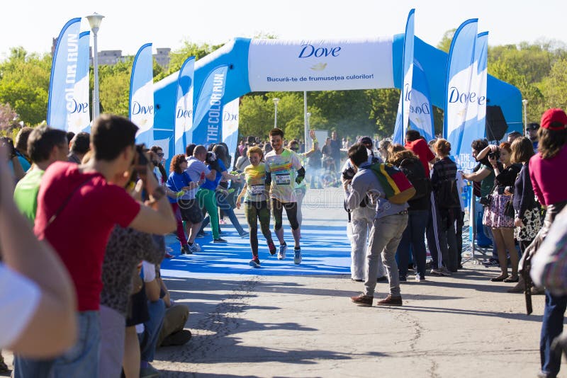 Runner Passing Under the Blue Gate Editorial Photography - Image of ...