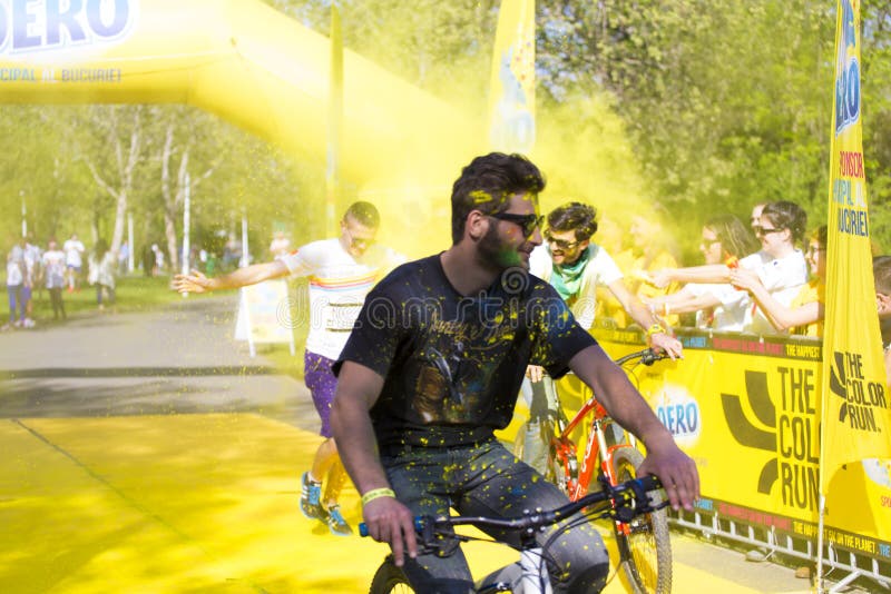 Runner Passing Under the Yellow Gate Editorial Stock Photo - Image of ...