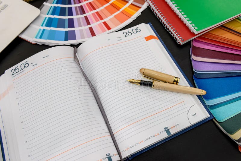 Color Sampler with Laptop and Diary in Office Stock Photo - Image of ...