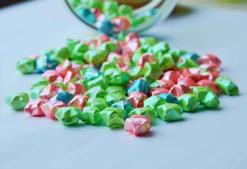 Color Star Paper Pour from Glass Bottle Stock Photo - Image of color ...