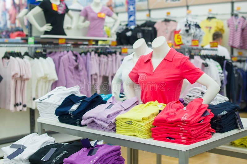 Color T-shirts and Mannequins on Table in Mall Stock Image - Image of ...