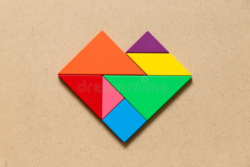 Tangram in Heart Shape Wait for Fulfill To Complete on Wooden Ba Stock ...