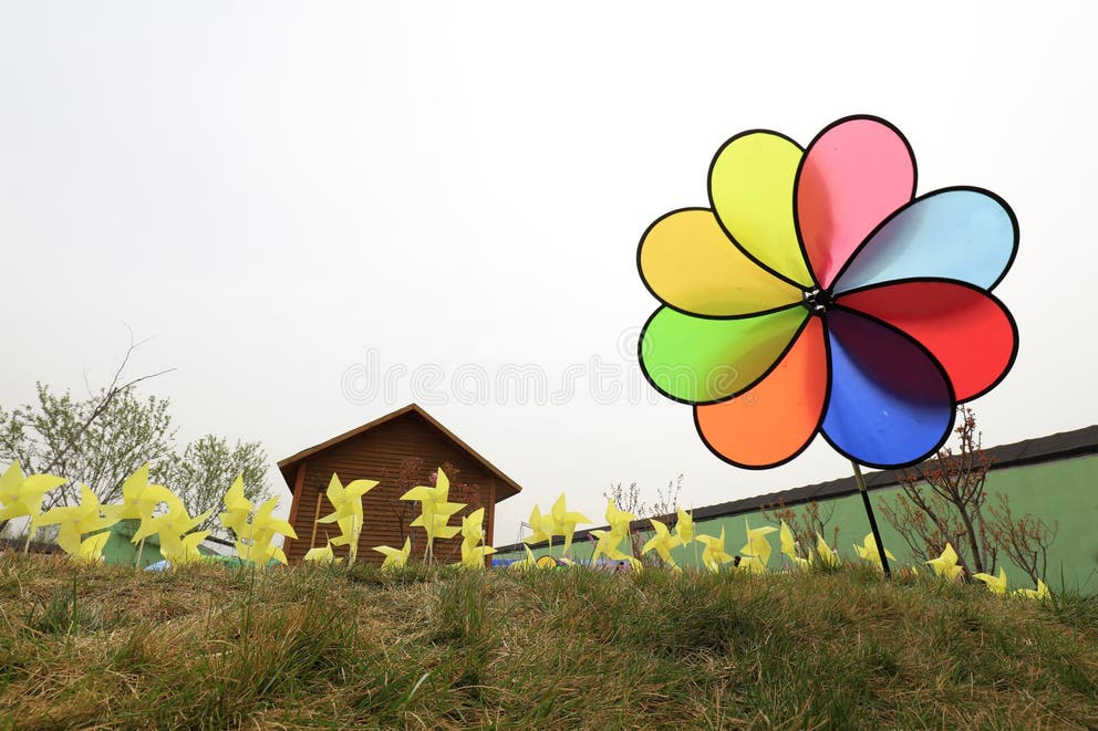 Color windmill in the park stock photo. Image of propeller - 370698854