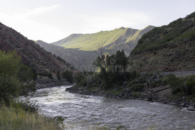 COLORADO RIVER FLOWING DOWN HILL through the MOUNTAINS Stock Photo ...