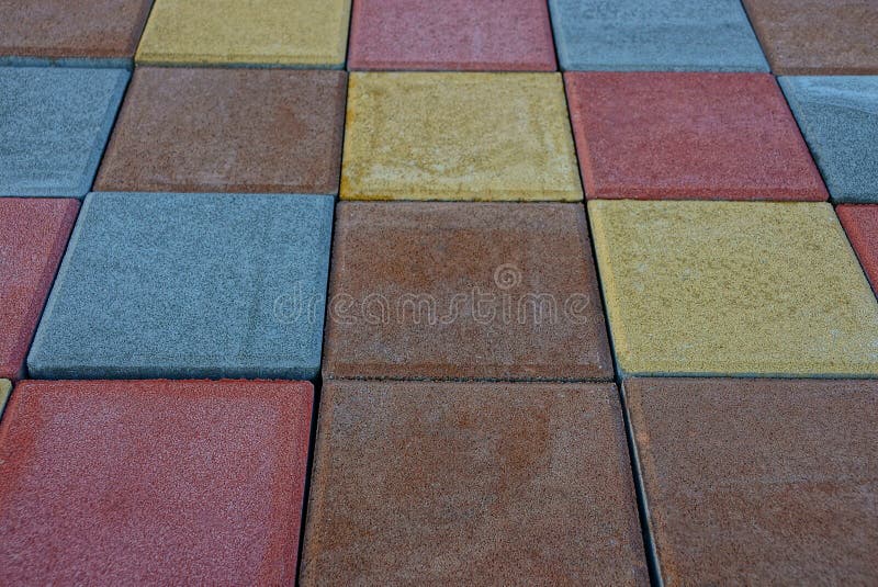 Colored Texture of Stone Square Tiles on the Sidewalk Stock Image ...