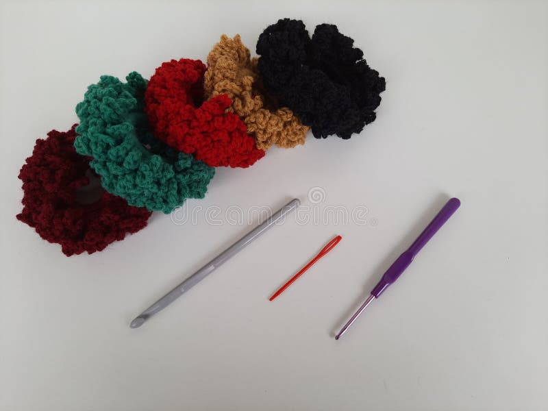 Colored Balls of Crochet Thread, Scissors and a Needle on a White ...