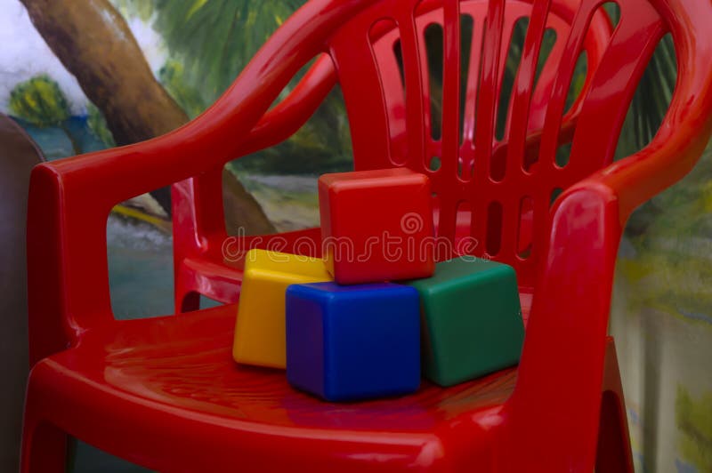 The Colored Blocks are on a Red Children`s Chair Stock Image - Image of ...