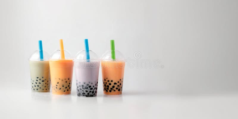 Colored Bubble Tea Drinks in Plastic Cups with Tapioca Balls on White ...