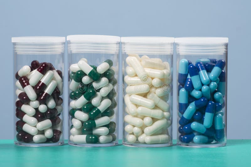 Colored Capsule of Medicine in Plastic Storage Container Stock Photo ...