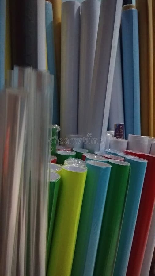 Colored Cardboard Rolls and Plastic Covers1 Stock Image - Image of ...