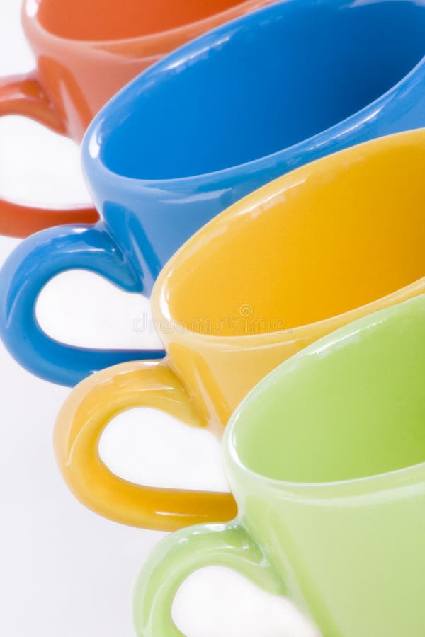 Colored ceramic mugs stock image. Image of bright, green - 4560391
