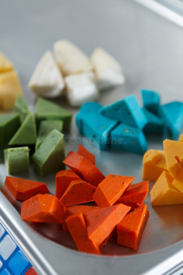 Colored Cheese Assortment on Weighs. Pieces of Multi Colored Dairy ...