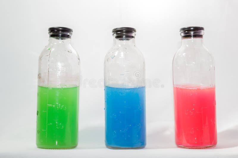 Colored Chemicals, Glass Bottles on a White Background Stock Image ...