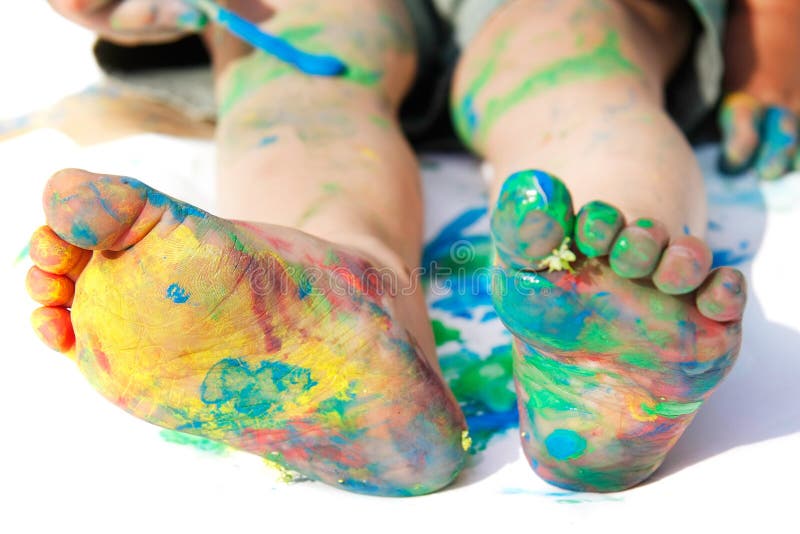 Colored child s feet stock photo. Image of home, child - 10591680