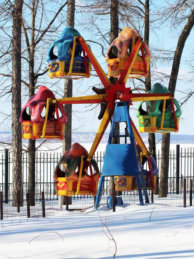 Colored Children`s Carousel Wheel in Winter Park Stock Image - Image of ...