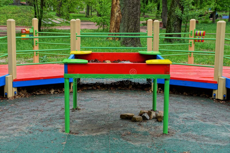 Colored Children Table Stands on the Ground on the Playground Stock ...