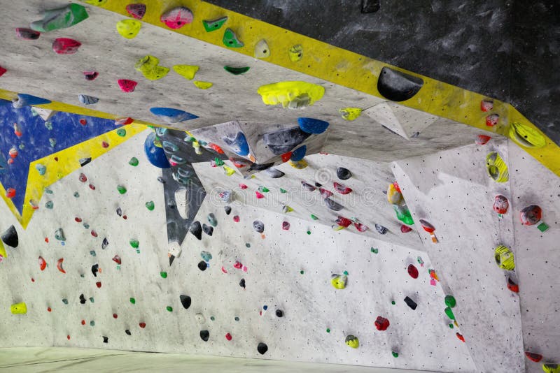 Colored Climbing Wall for Training at Modern Bouldering Gym Stock Image ...