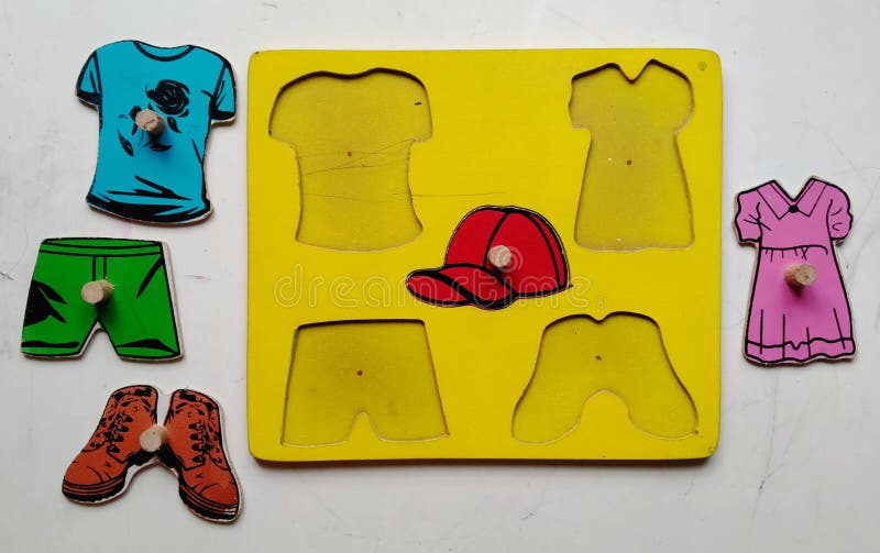 Colored Clothes Button Puzzle Stock Photo - Image of shirt, button ...