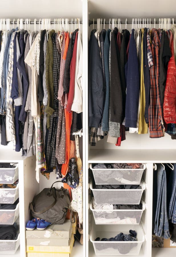 Colored Clothes in the Closet. Storage of Clothes and Things in the ...