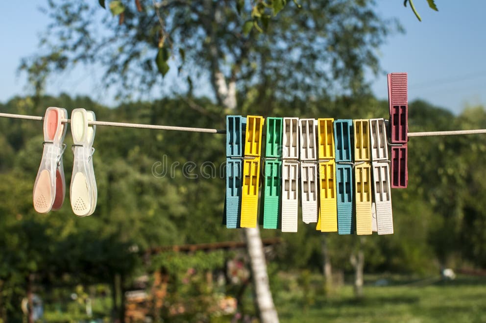 Colored clothesline clips stock image. Image of clean - 60308247