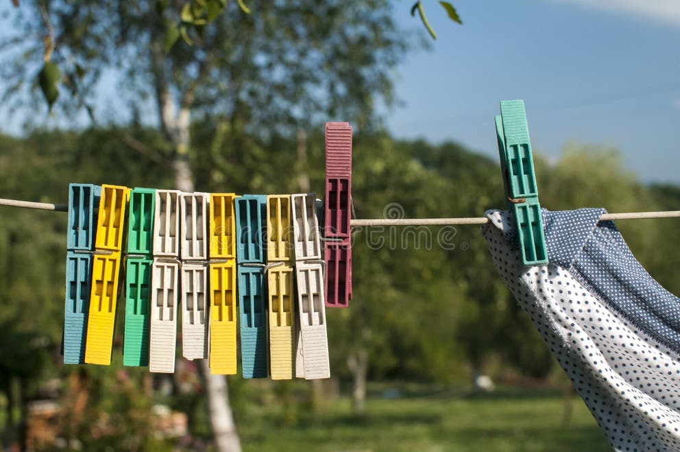 Colored clothesline clips stock photo. Image of household - 60308296