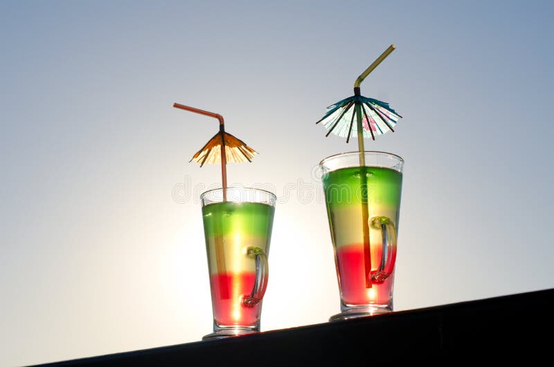 Tricolor Cocktail On The Bar Counter With A Sandy Beach Overlooking The ...