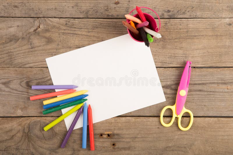 Colored Crayons and Blank Page on the Wooden Table Stock Image - Image ...