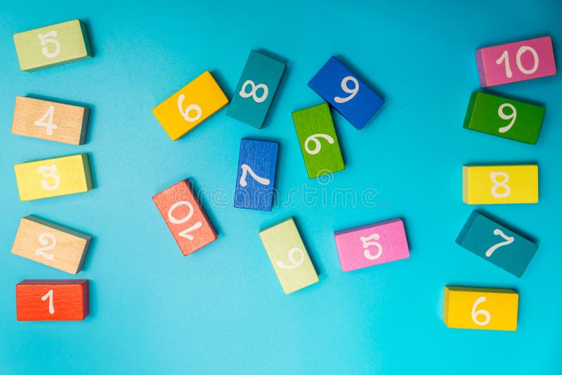 Colored Cubes with Numbers on a Blue Background Stock Image - Image of ...