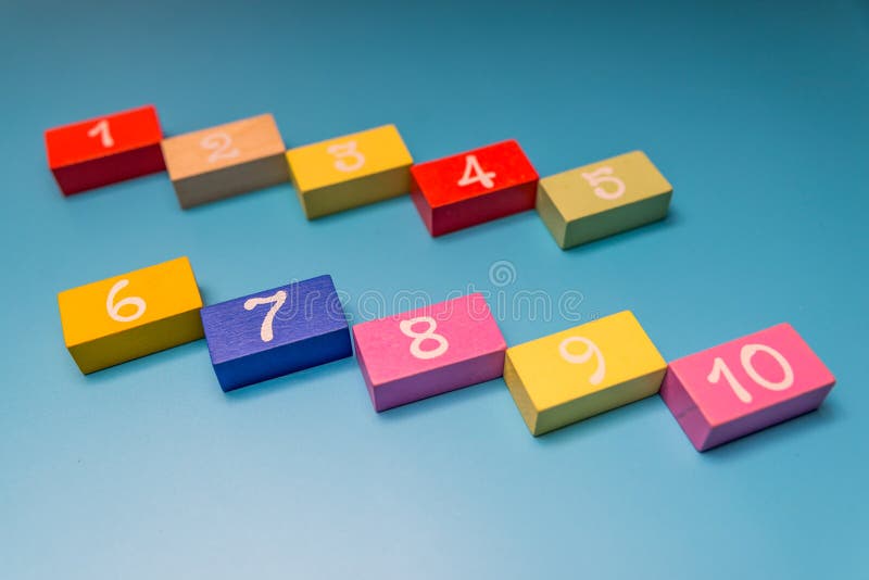 Colored Cubes with Numbers on a Blue Background Stock Photo - Image of ...