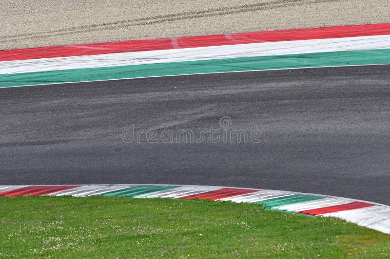 Colored Curbs on a Racing Track Stock Photo - Image of grass, curbs ...