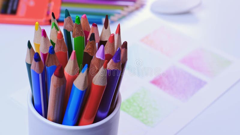 Colored Drawing Pencils in a Variety of Colors, Hand Chooses a Pencil ...