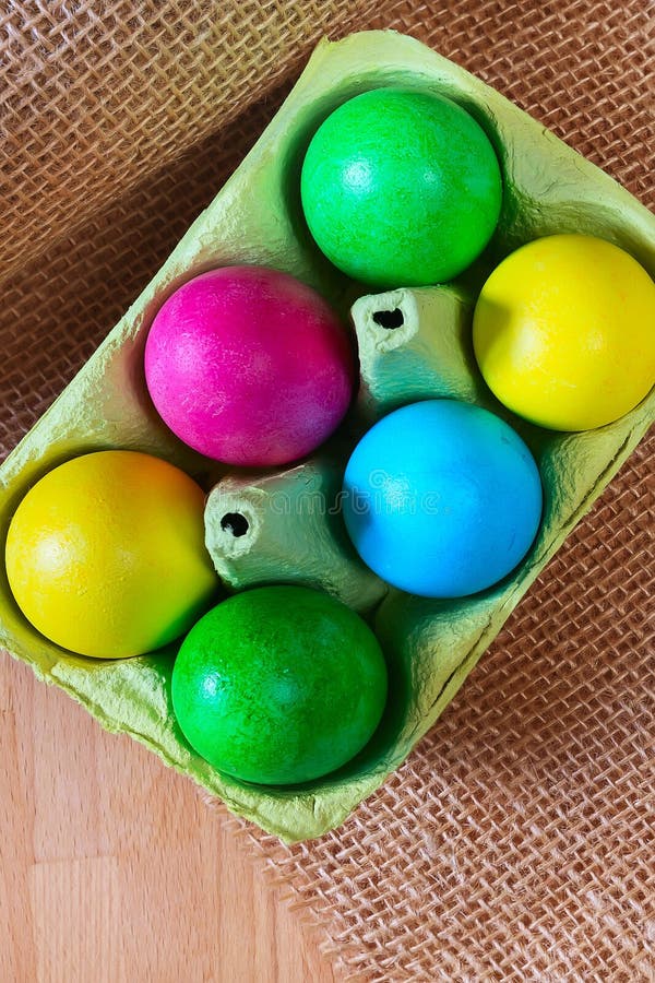 Colored Easter Eggs in Egg Carton Holder Stock Photo - Image of ...