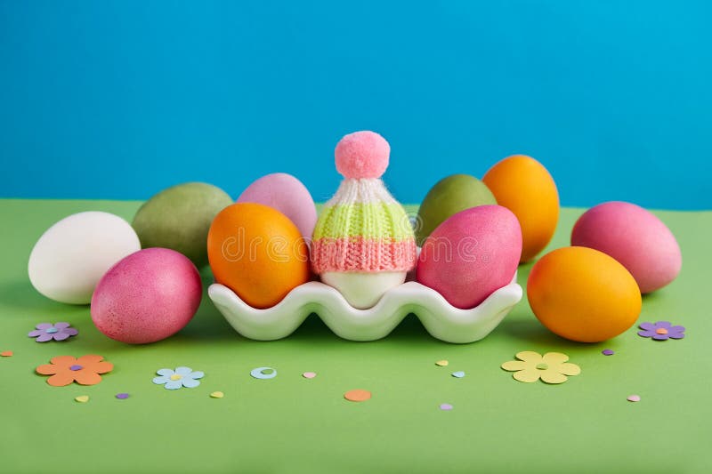 Colored Easter Eggs, One Egg Decorated with Hat. Spring Greeting Card ...