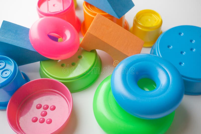 Colored Educational Toys for Babies, Cubes, Pyramids, Cones, Rings ...