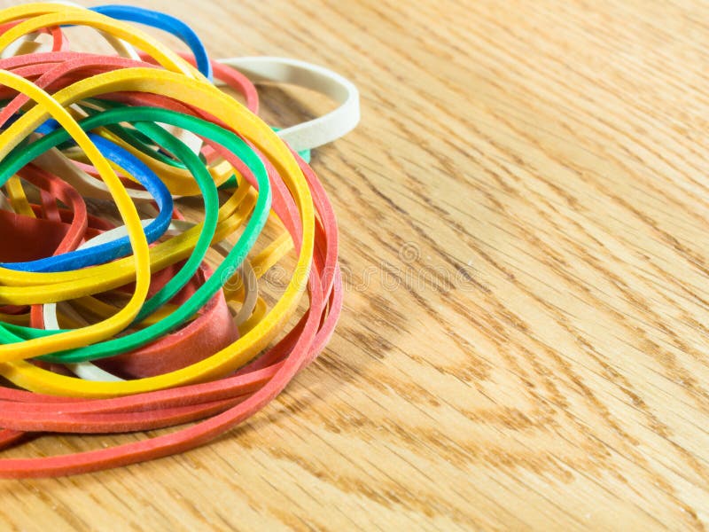 Colored Elastic Bands on Wooden Background Stock Image - Image of ...